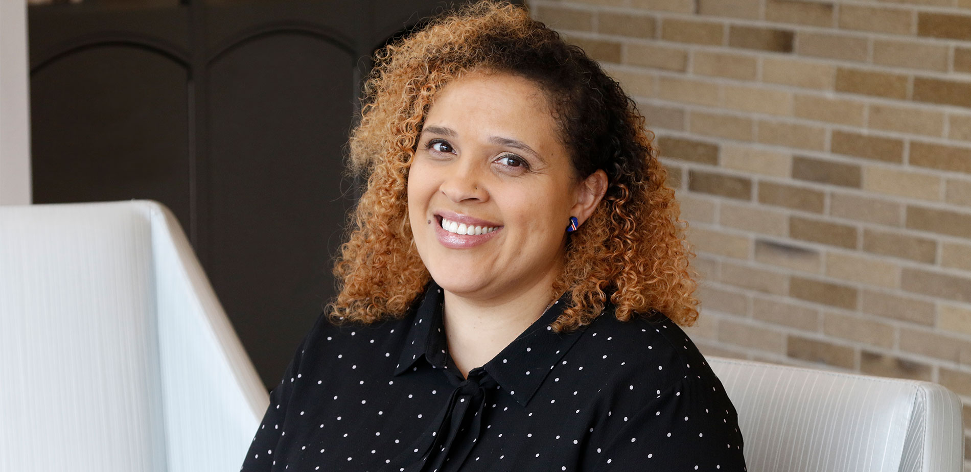 MEET OUR GRADUATES: Foster Care Alumna Pays it Forward | our.ric.edu